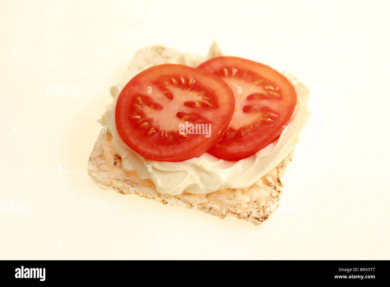 Rice Cracker with Tomato and Cream Cheese Stock Photo - Alamy