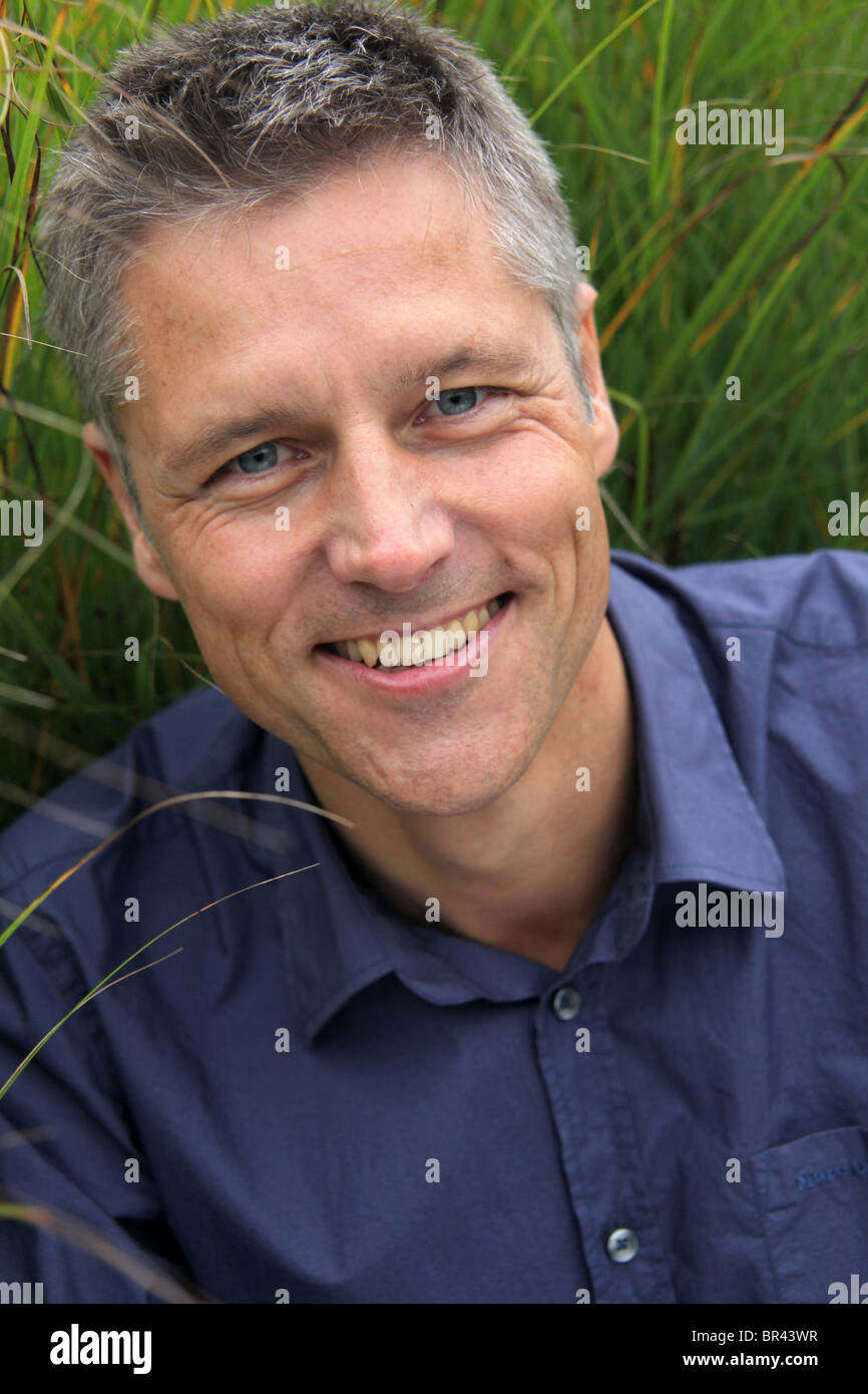 Smiling man outdoors, portrait Stock Photo - Alamy