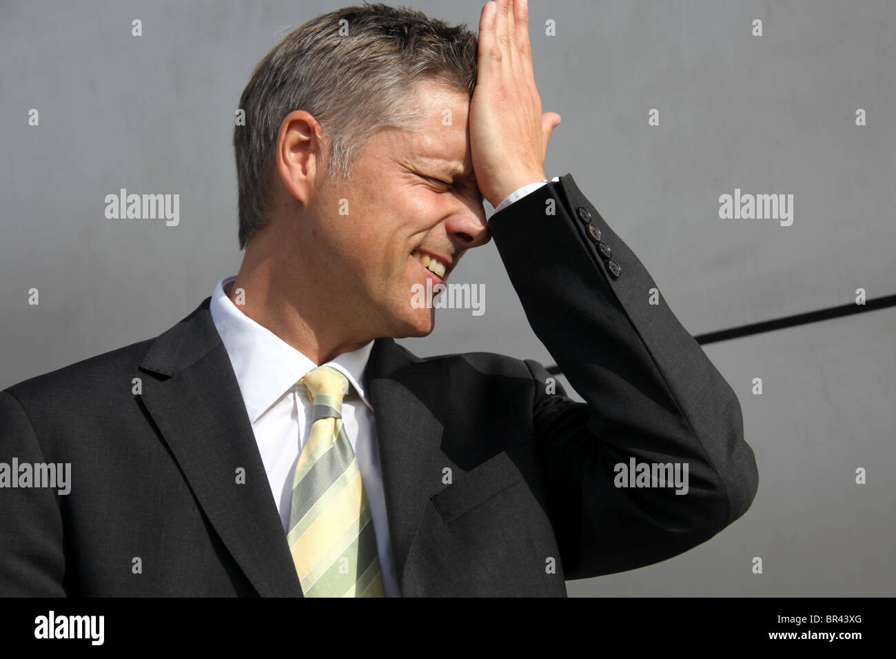 Putting on blazer hi-res stock photography and images - Alamy