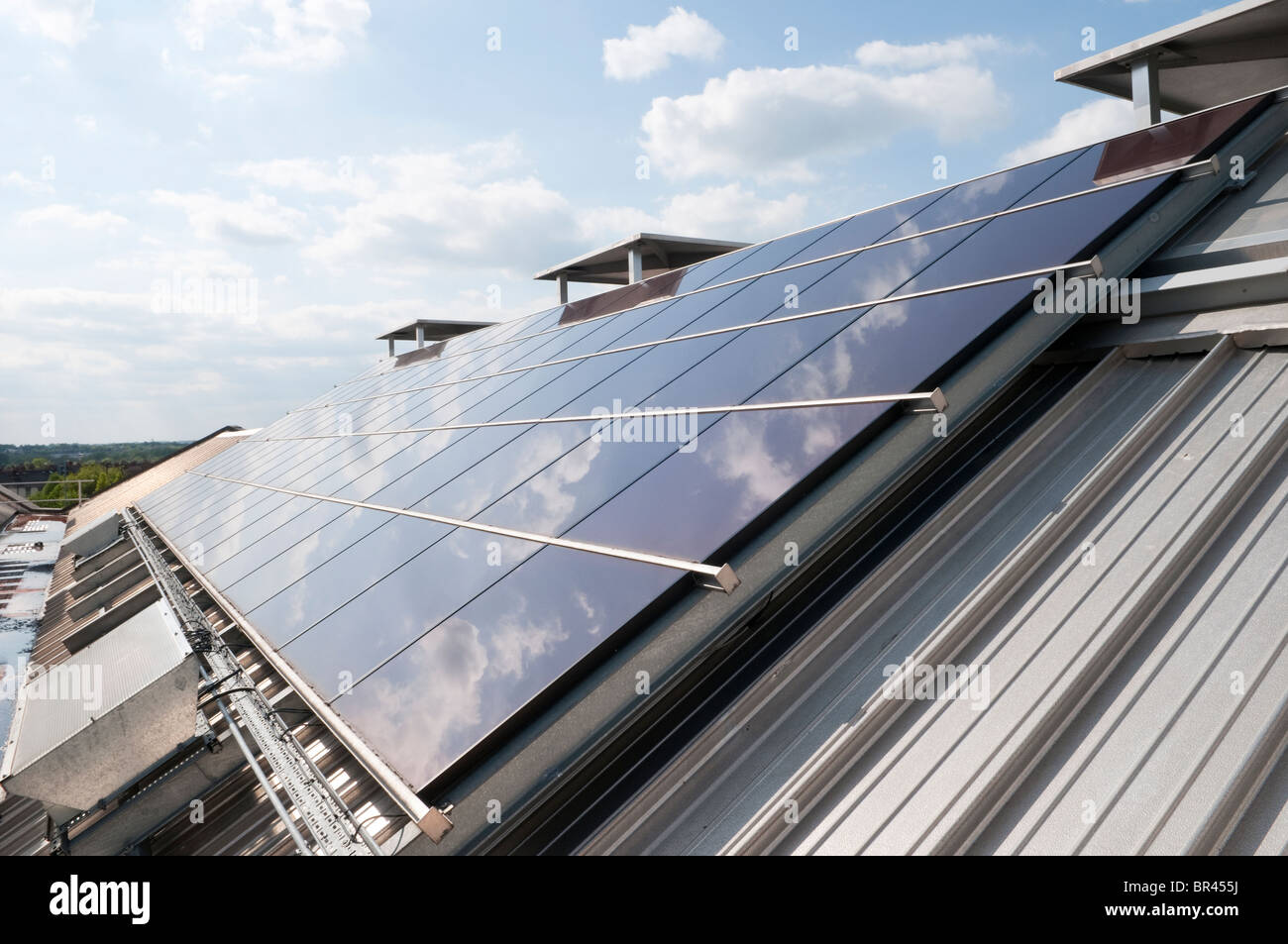 Photovoltaic solar panels (cells) on a roof in Swindon, Wiltshire, UK ...
