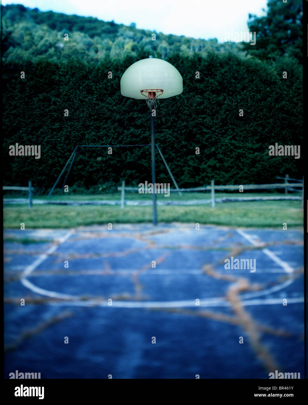 An adandoned basketball hoop on a basketball court in Chelsea, Vermont ...