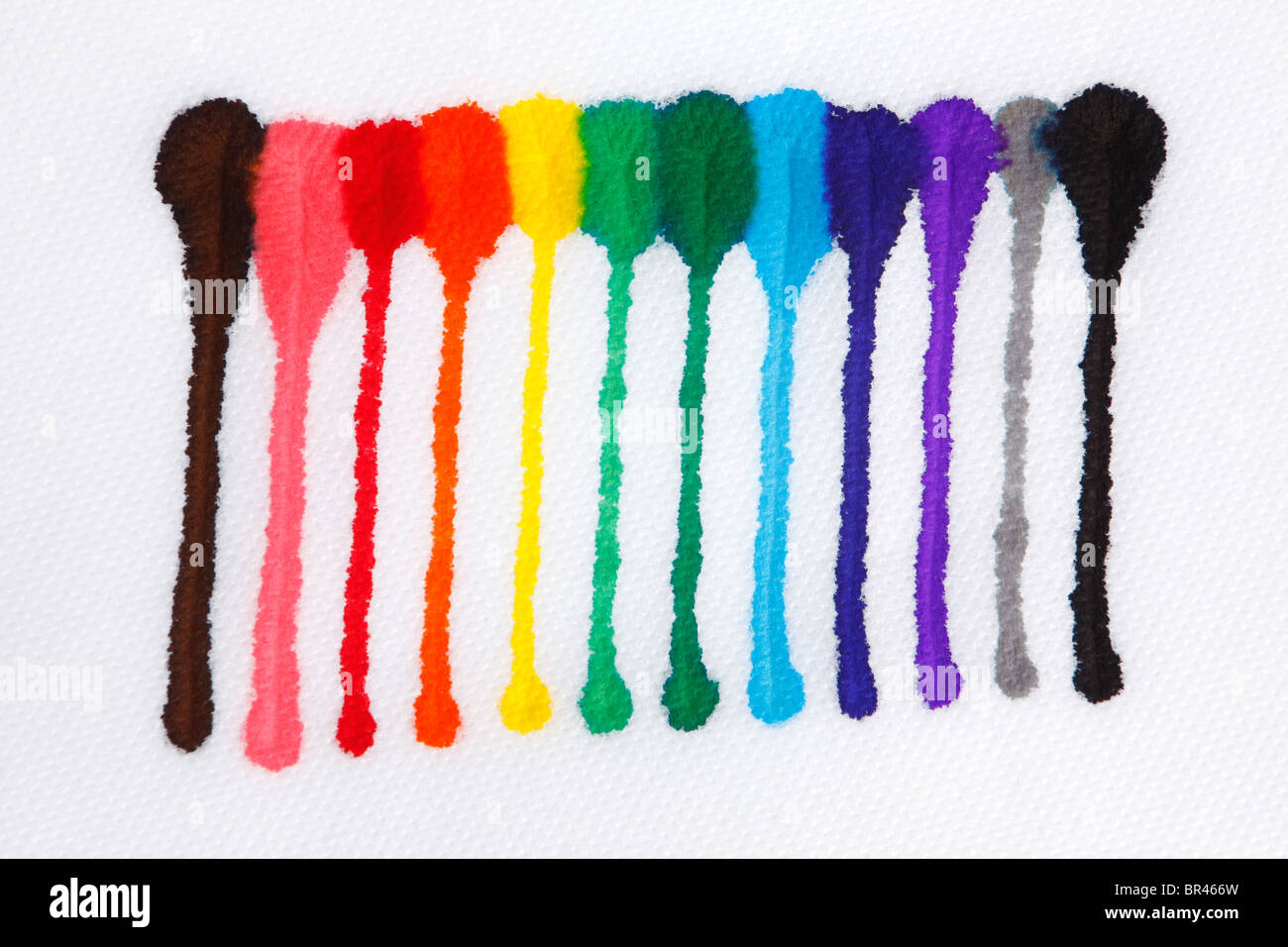 Colorful drops on white background. With beautiful vibrant colors ...