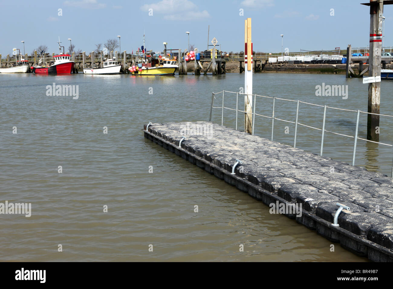 Floating modular plastic moored pontoon platform in the harbour Stock ...