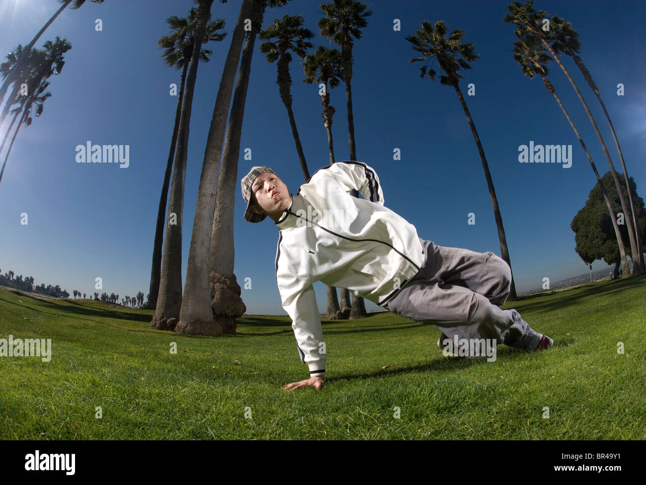 Man dances in grass, San Diego, California Stock Photo - Alamy