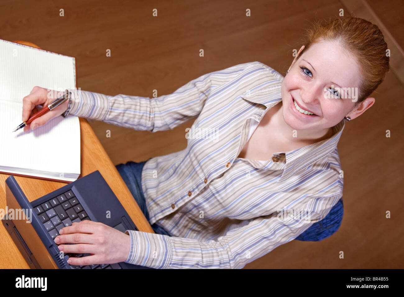 young woman with notebook Stock Photo - Alamy
