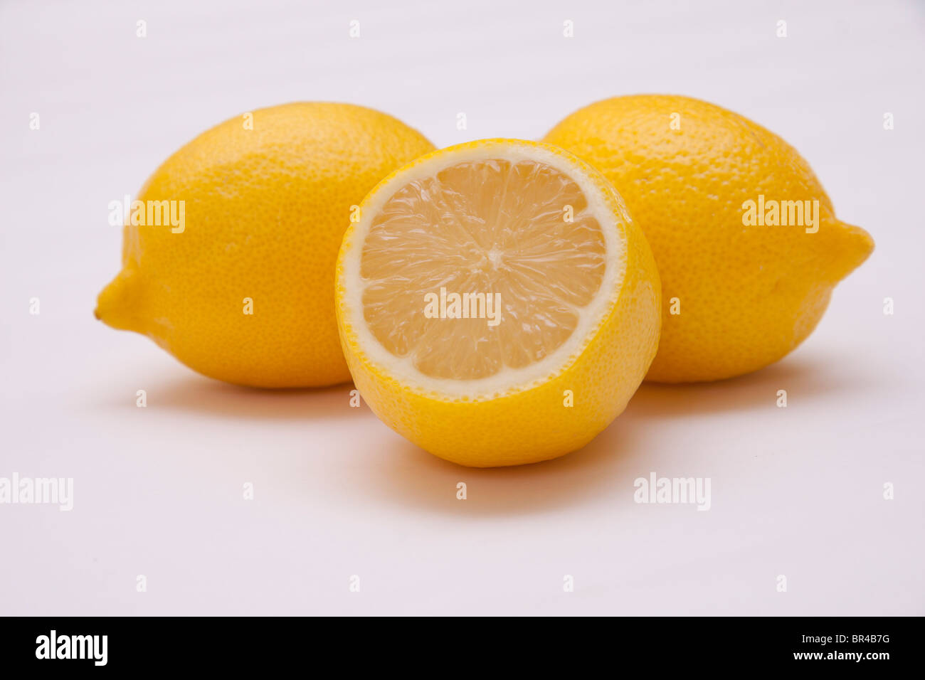 closeup of cross- sectioned of ripe yellow citrus fruits Stock Photo ...