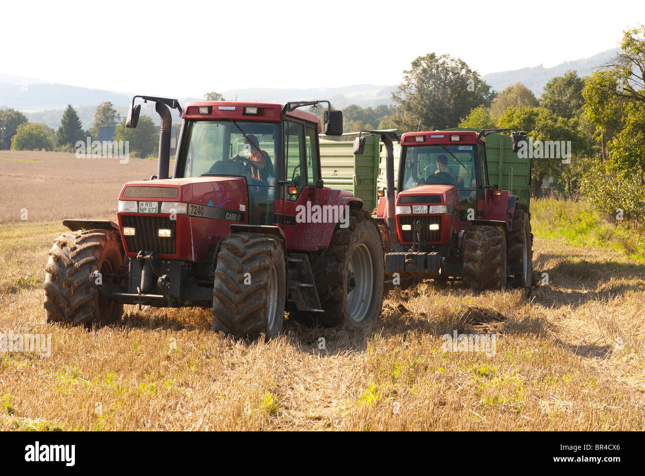 Tractor field agriculture Stock Photo - Alamy
