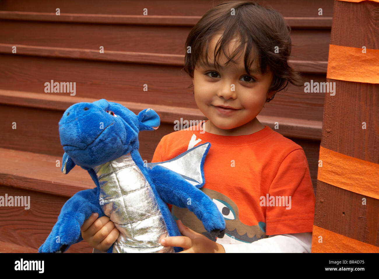 Boy with stuffed animal hi-res stock photography and images - Alamy
