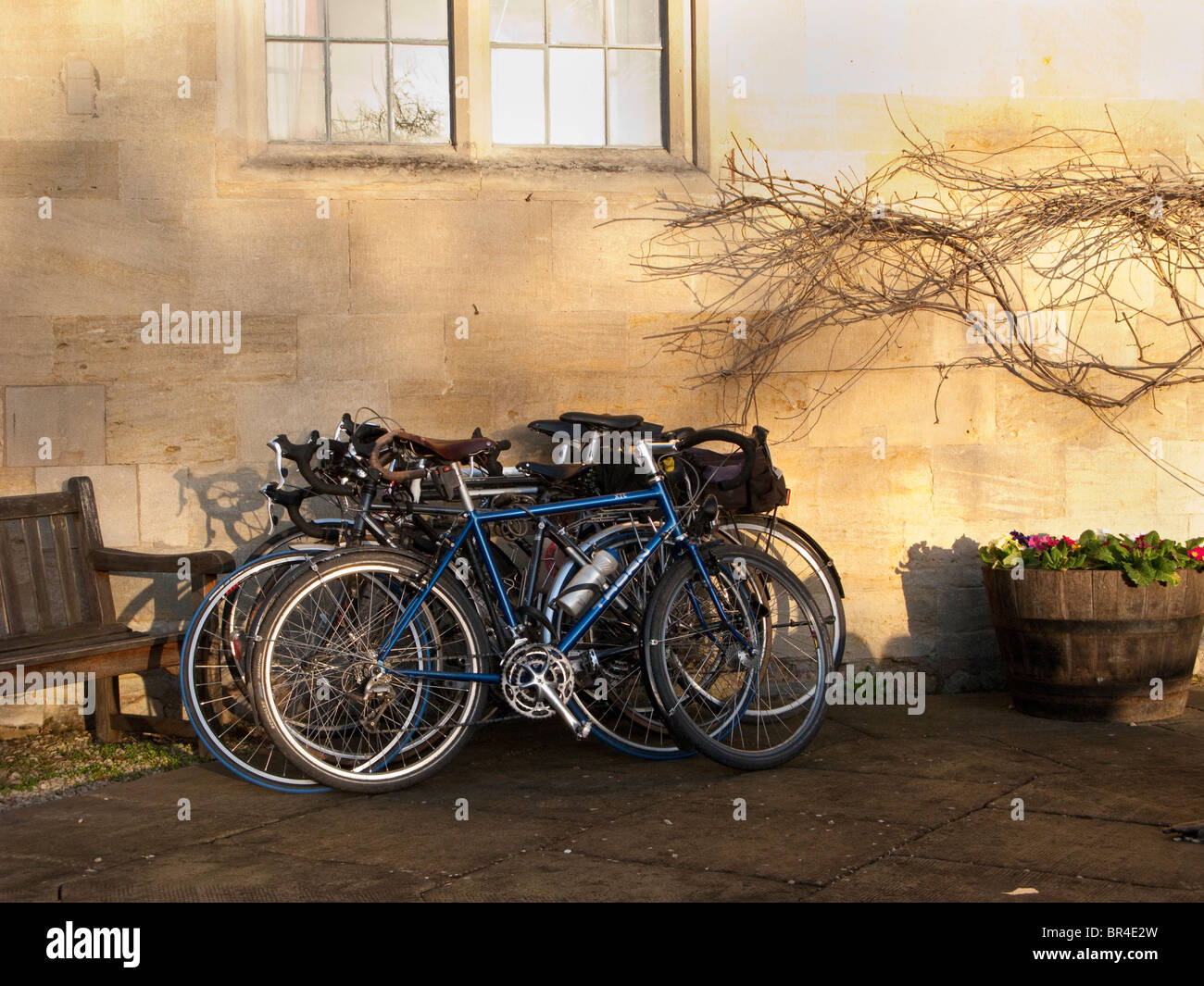 Tourists bicycles chained together outside cathedral Stock Photo - Alamy