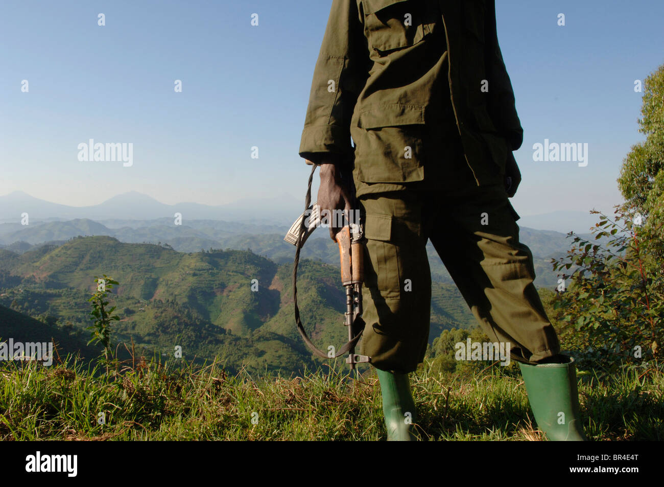 a park ranger stands with a rifle Stock Photo - Alamy