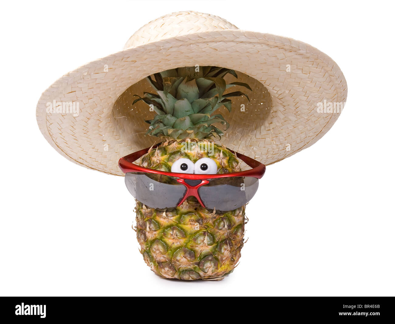 pineapple with hat isolated on white background Stock Photo - Alamy