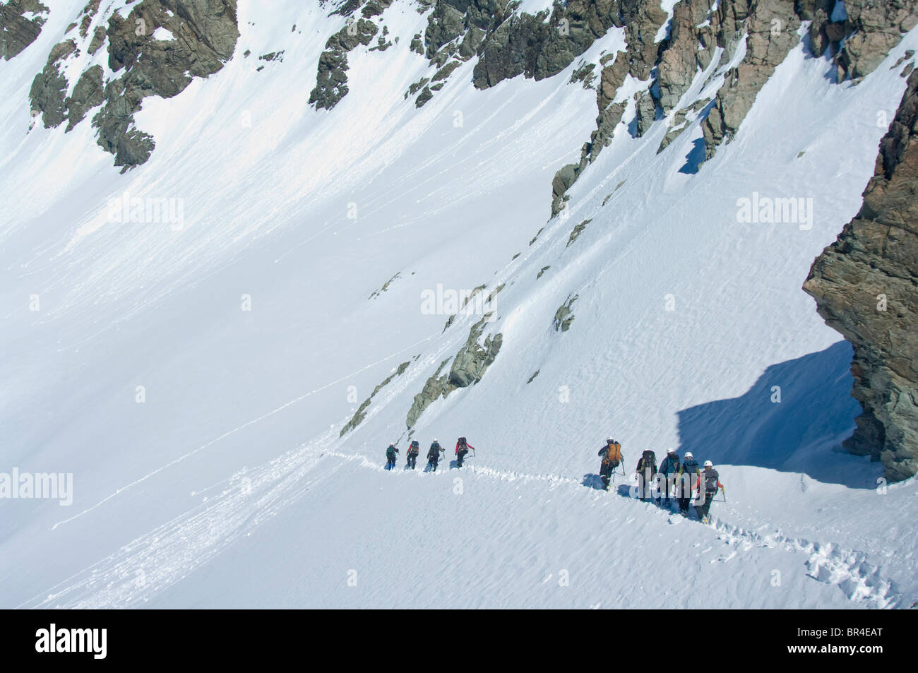New Zealand, South Island, Arrowsmith Range. NOLS students traversing a ...