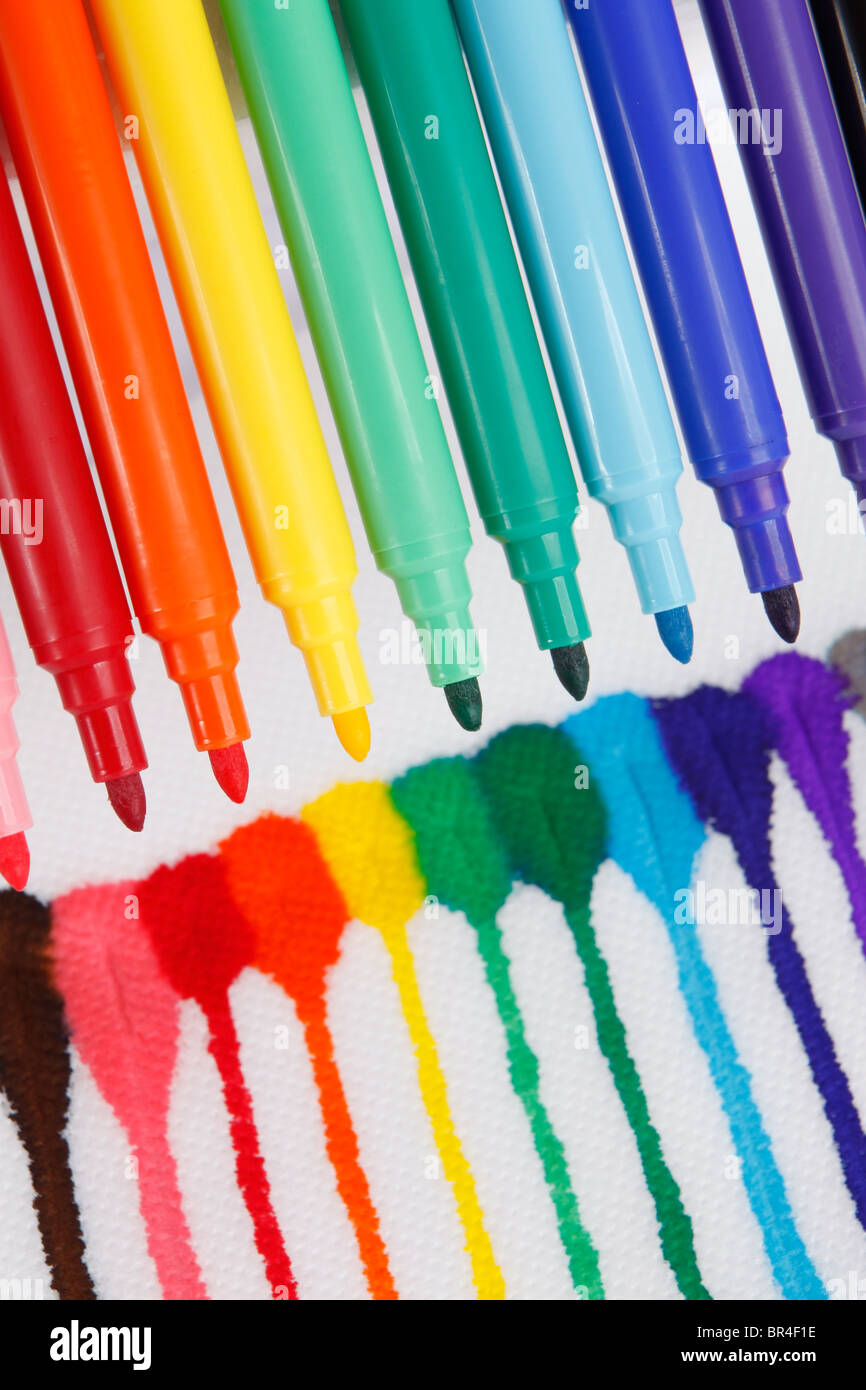 Colorful markers on white background. With beautiful vibrant colors ...