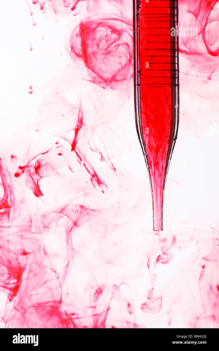 Pipette with red liquid Stock Photo - Alamy