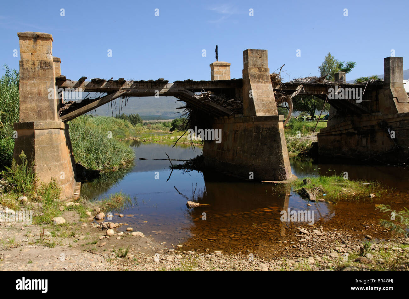 Disused railway bridge passing over the Buffeljags River in the Cape ...