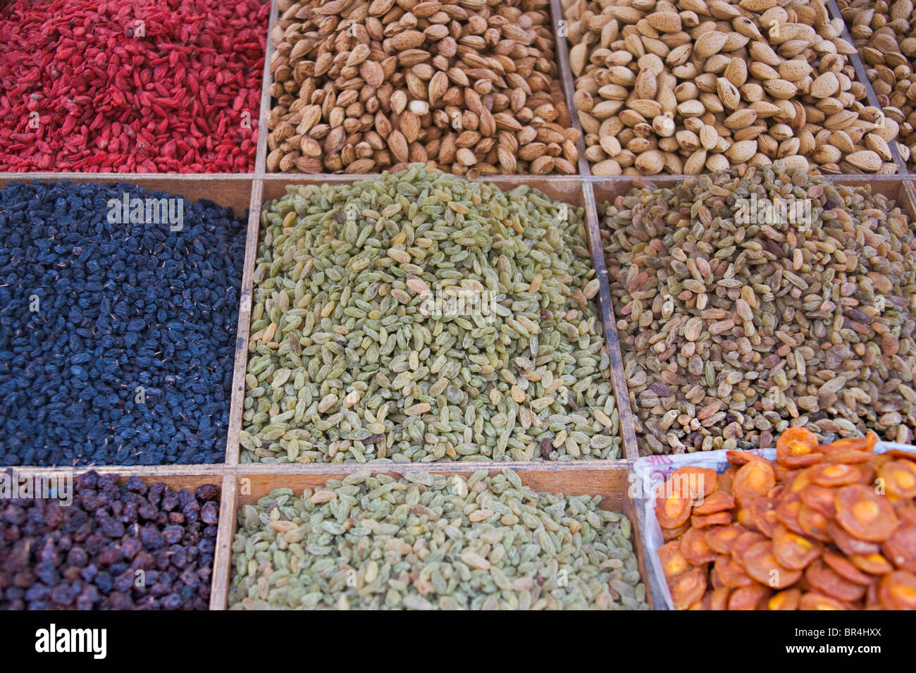Dried fruit and nuts at the market, Dunhuang, Gansu Province, China ...