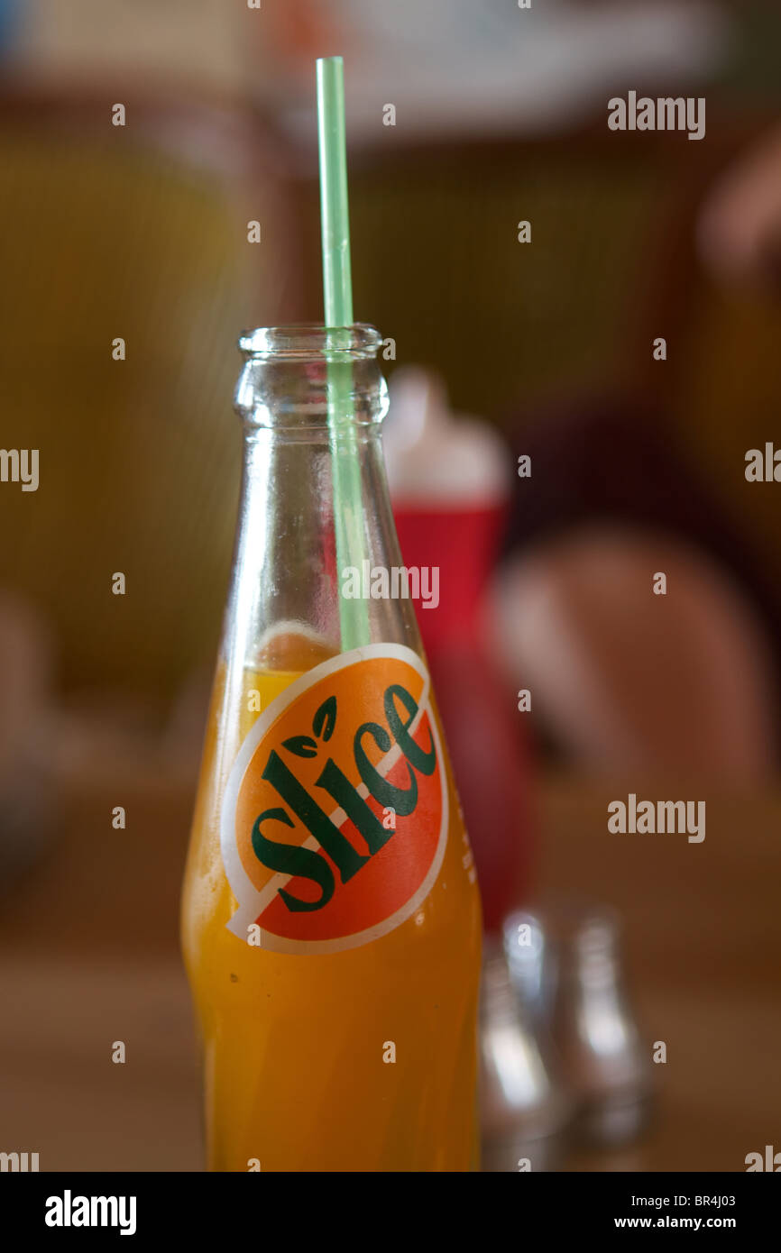 glasse bottle of slice Stock Photo - Alamy