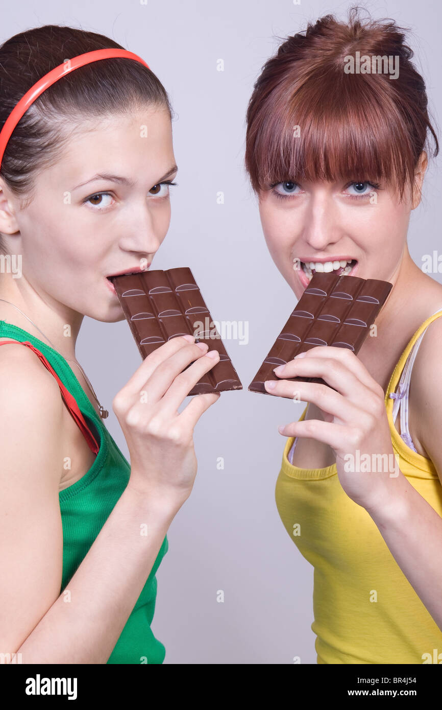 two girls with chocolate Stock Photo - Alamy