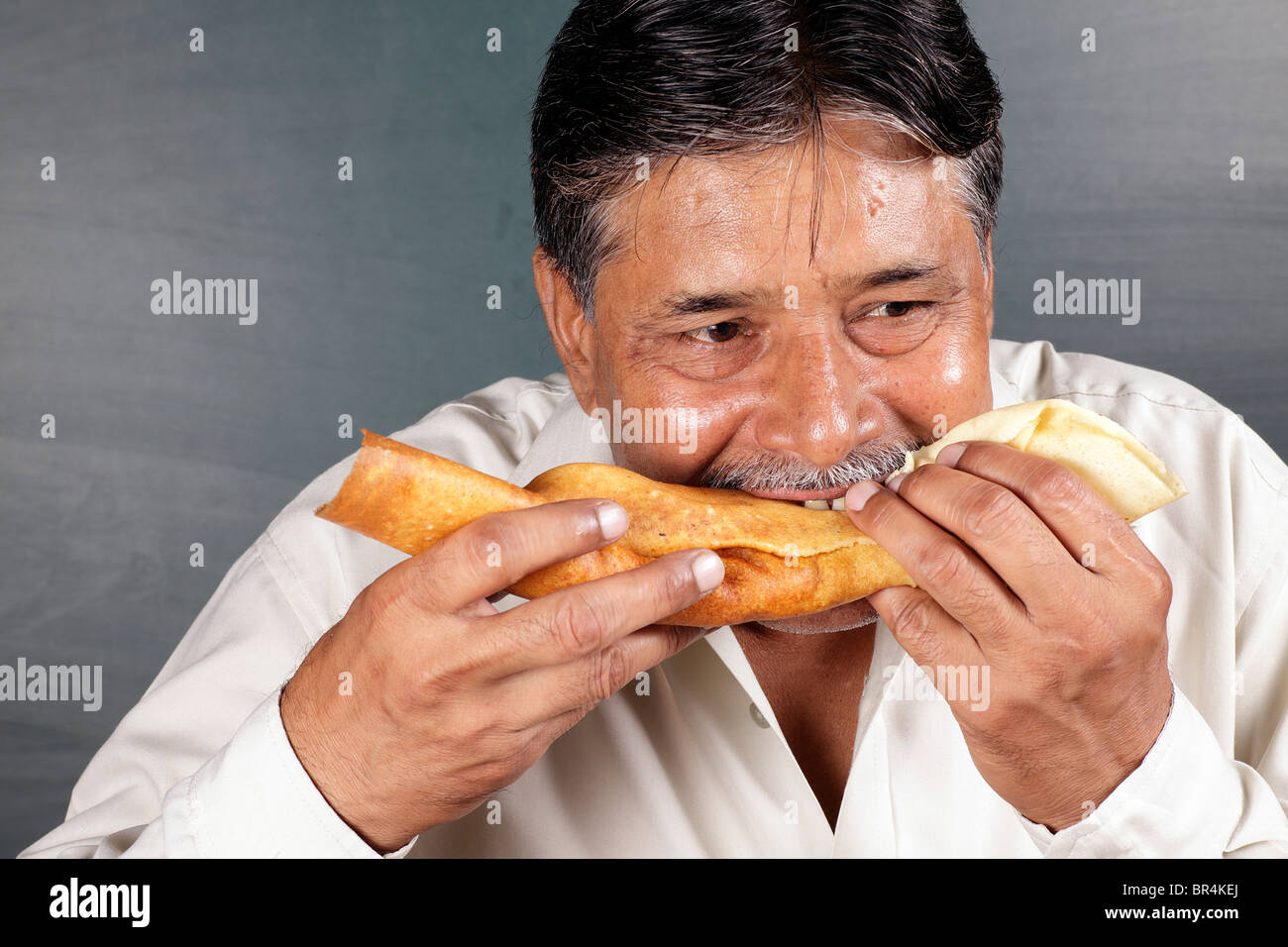 Eating curry not smile hi-res stock photography and images - Alamy