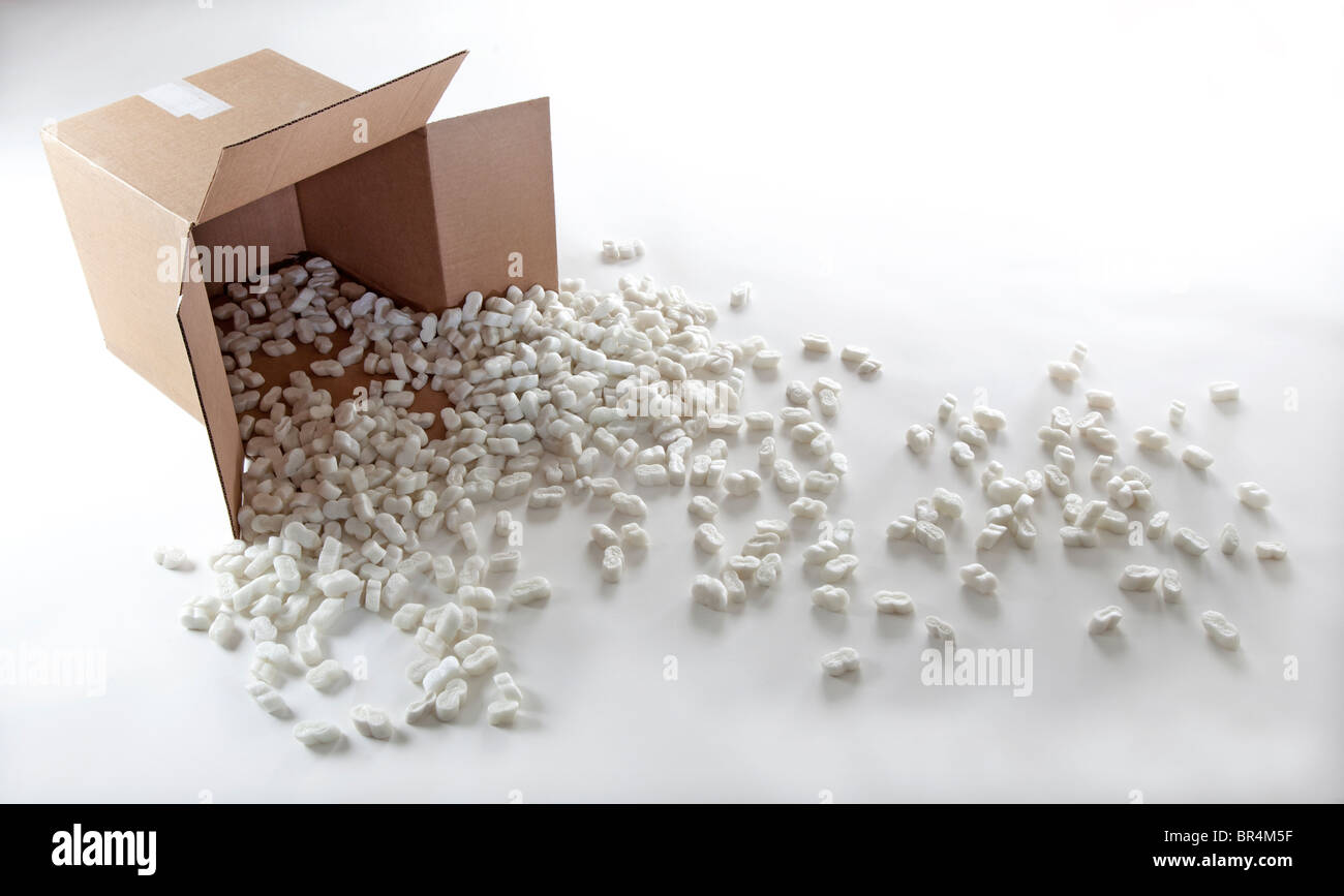 packing peanuts spill from cardboard box Stock Photo - Alamy