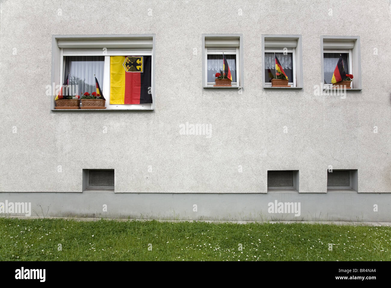 German flags at block of flats Stock Photo - Alamy