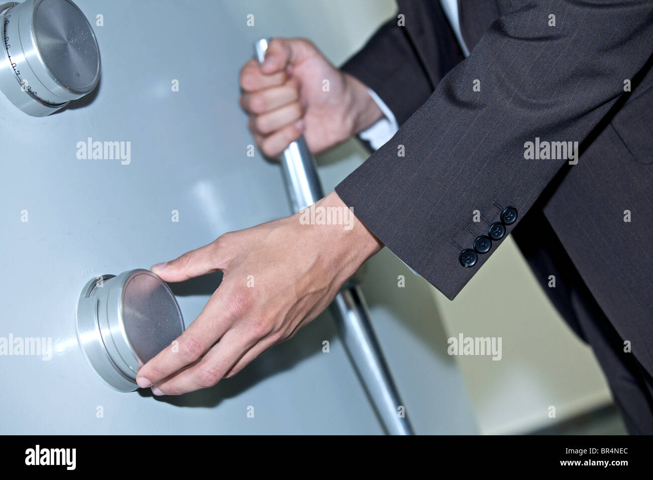 Man opening vault hi-res stock photography and images - Alamy