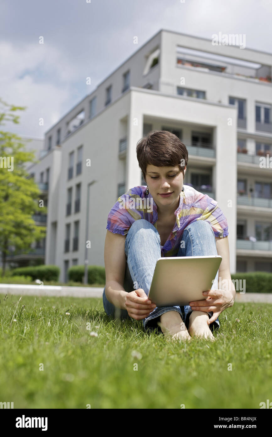 Person using ipad in vertical hi-res stock photography and images - Alamy