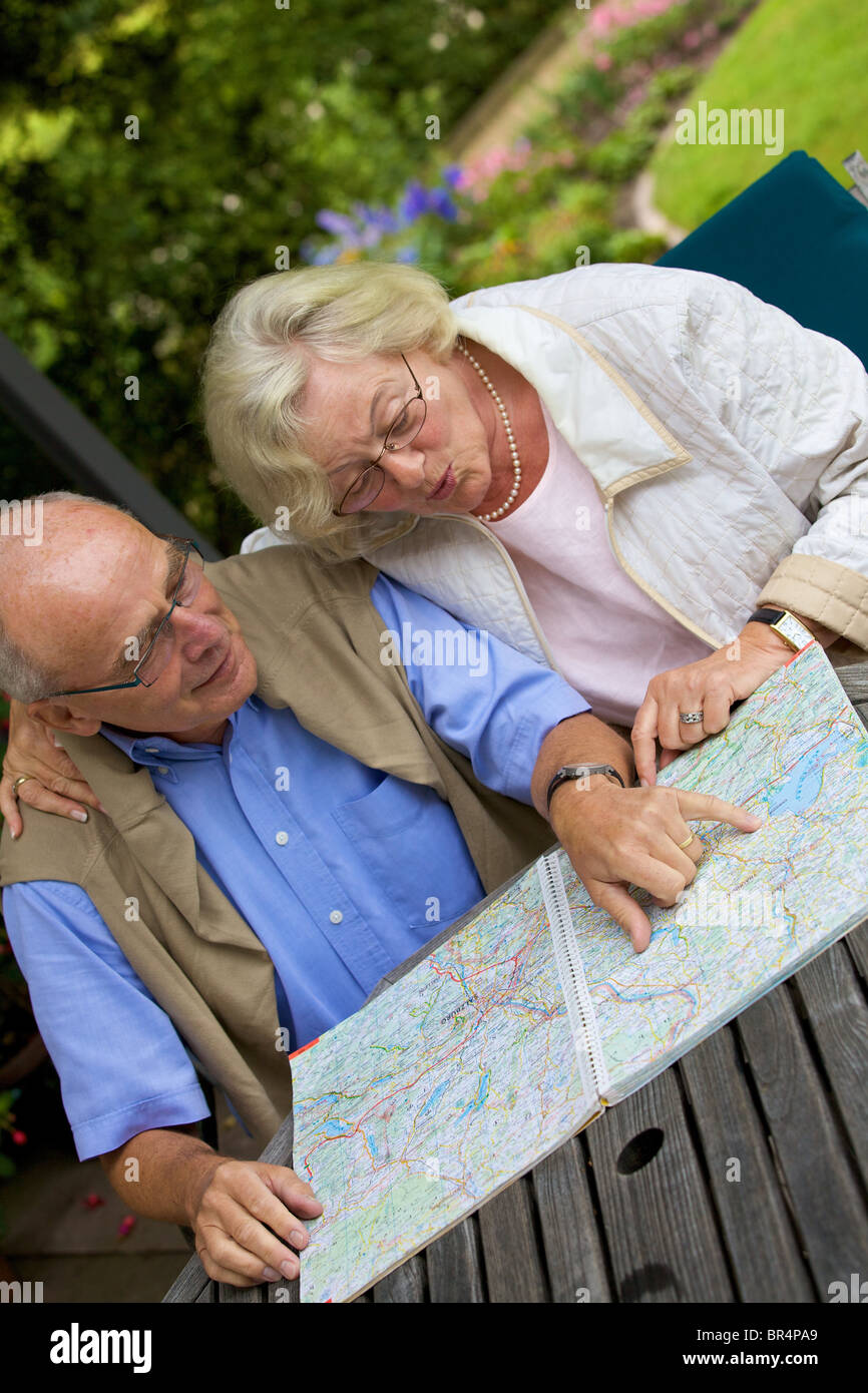 Senior couple watching road map hi-res stock photography and images - Alamy