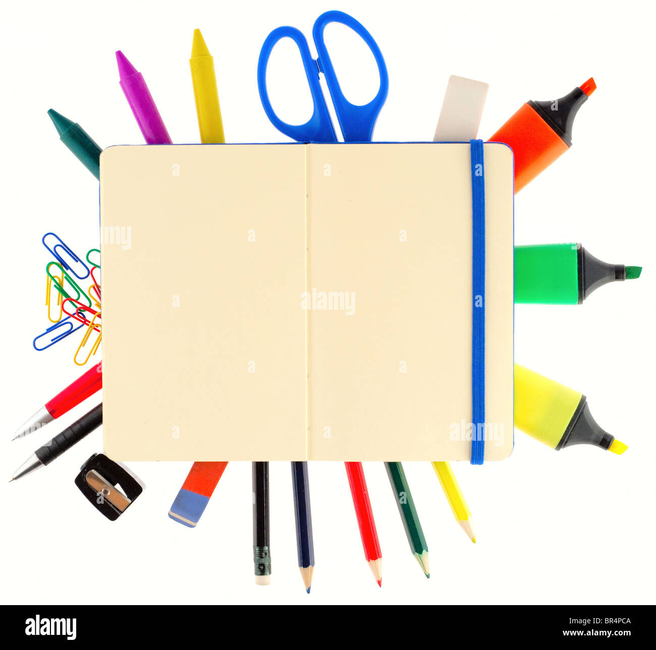 Notepad with stationary objects on white background Stock Photo - Alamy