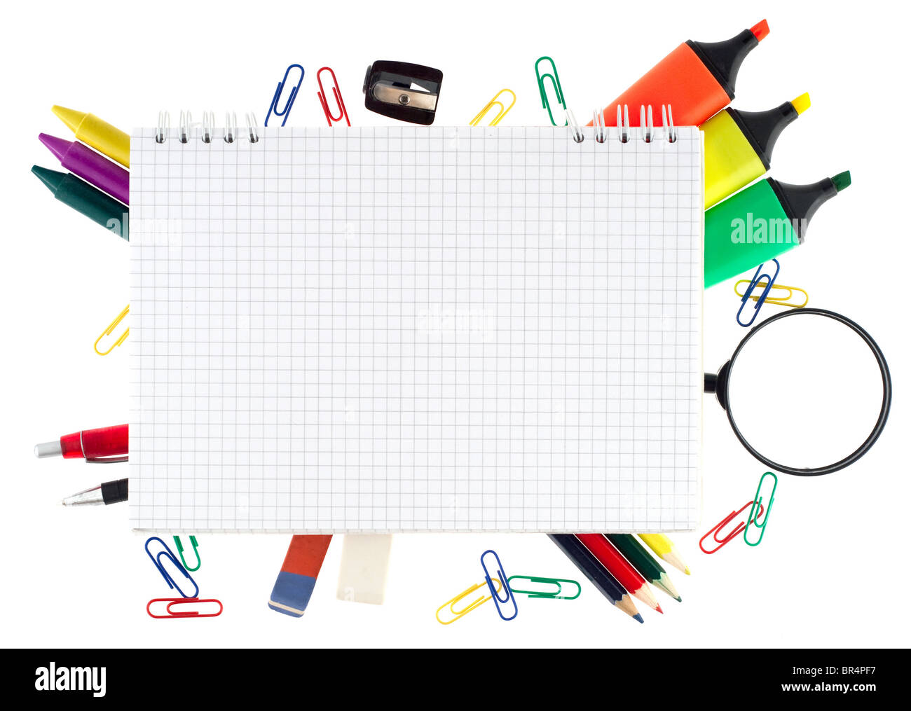 Notepad with stationary objects on white background Stock Photo - Alamy