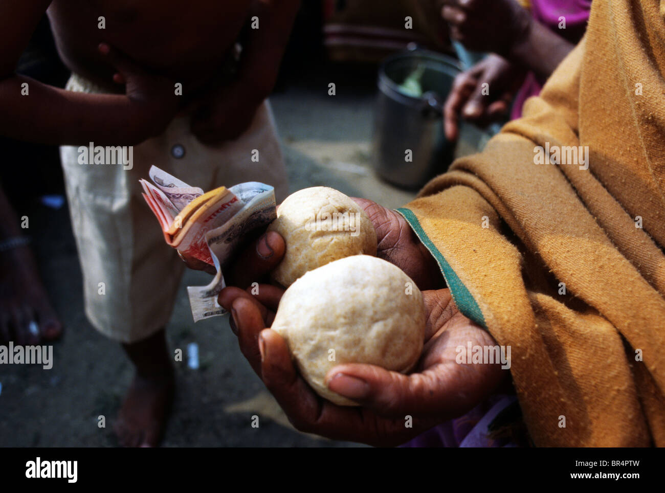 Mother of the child is carrying money and child's hair wrapped in ...