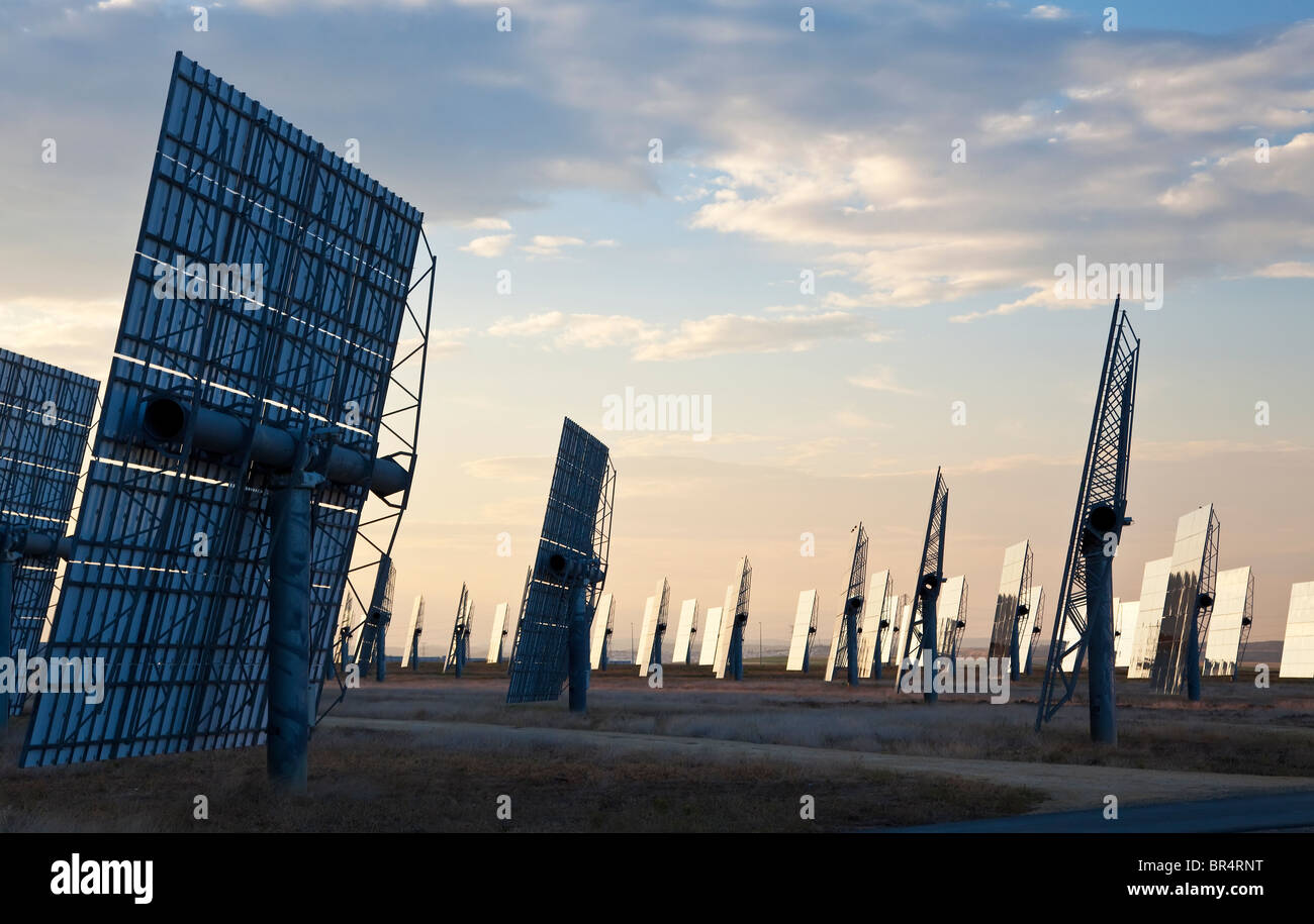 A field of solar mirror panels harnessing the sun's rays to provide ...