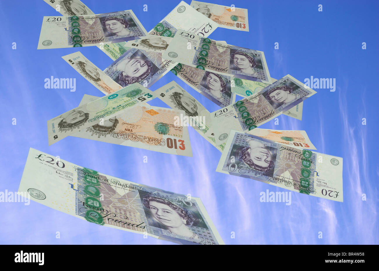 Pound notes falling hi-res stock photography and images - Alamy