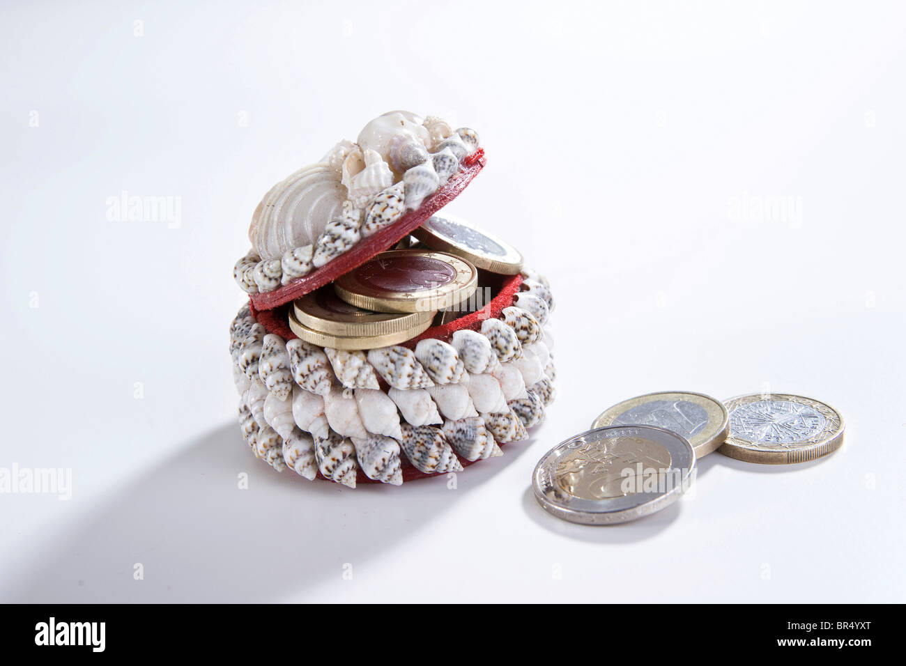 Coins in a jewelry box Stock Photo - Alamy