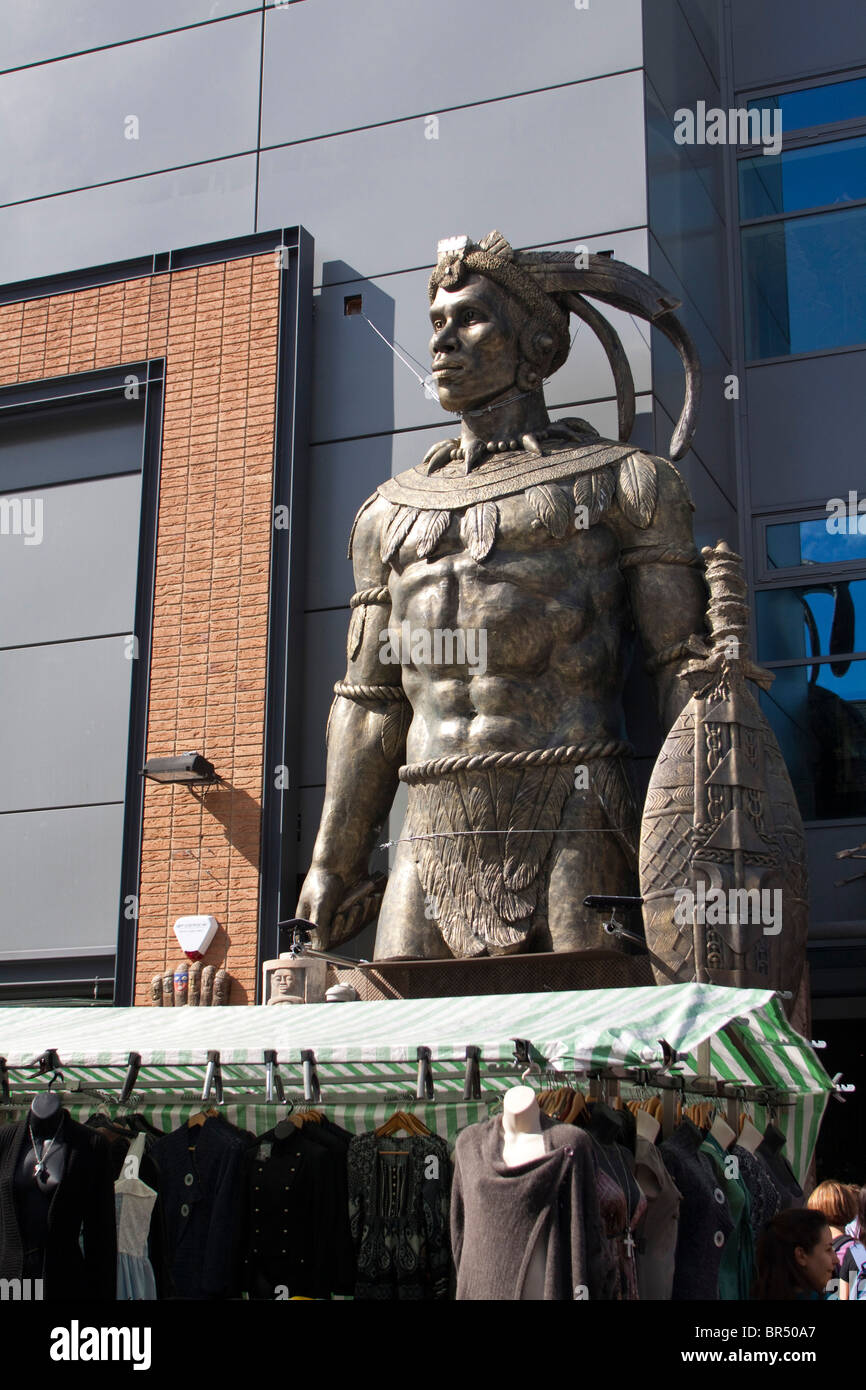 Indian man statue advert outside fashion shop Camden lock market London ...