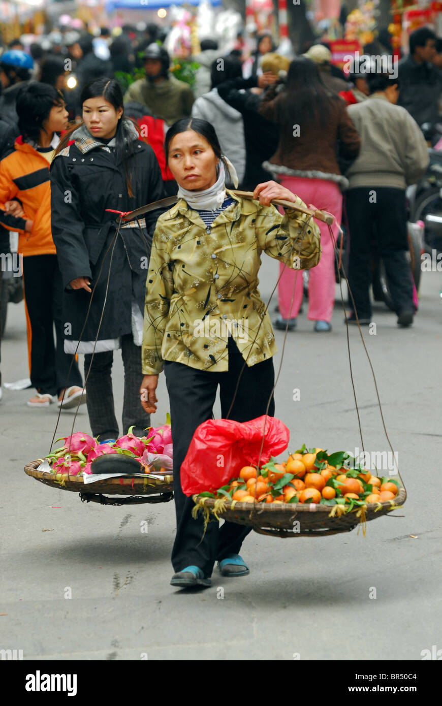 Vietnam, Hanoi: street peddler Stock Photo - Alamy