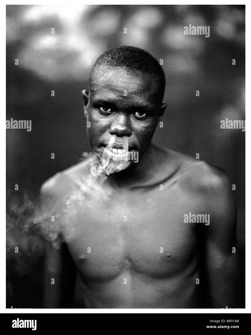 Portrait of young Gambian man Stock Photo - Alamy