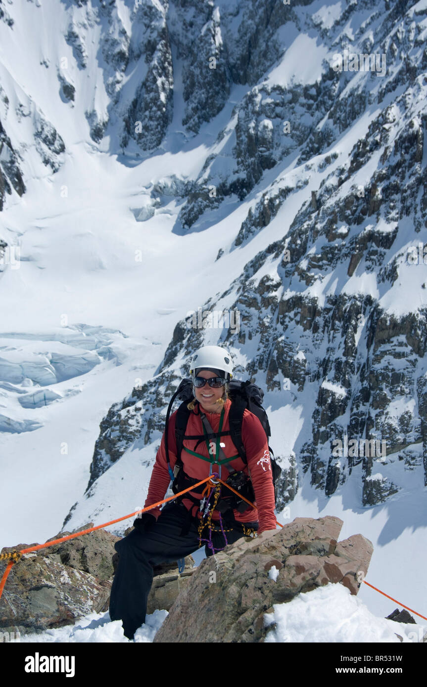 New Zealand, South Island, Arrowsmith Range. NOLS student Annie Baker ...
