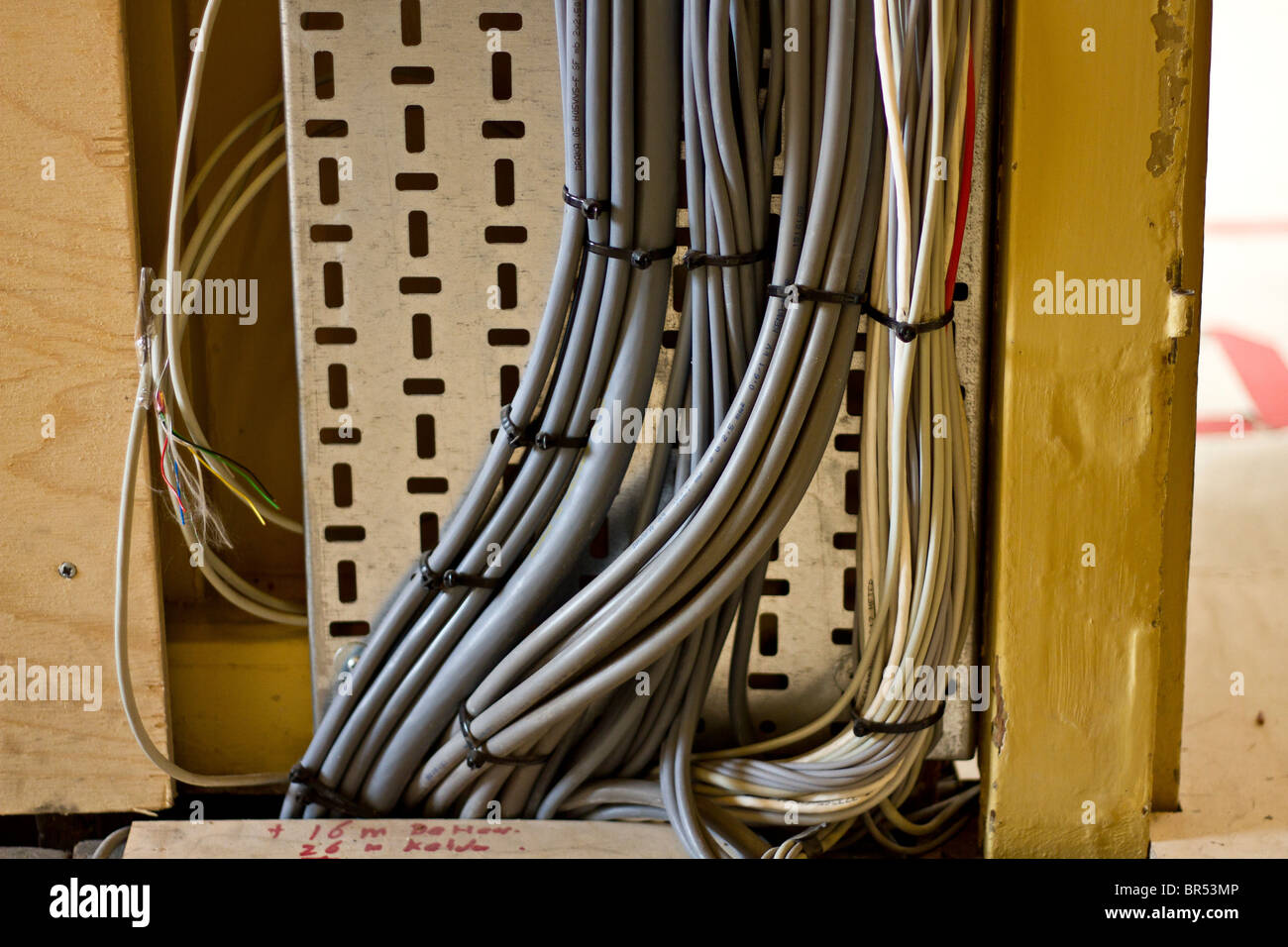 Electric cabling inside a building Stock Photo - Alamy