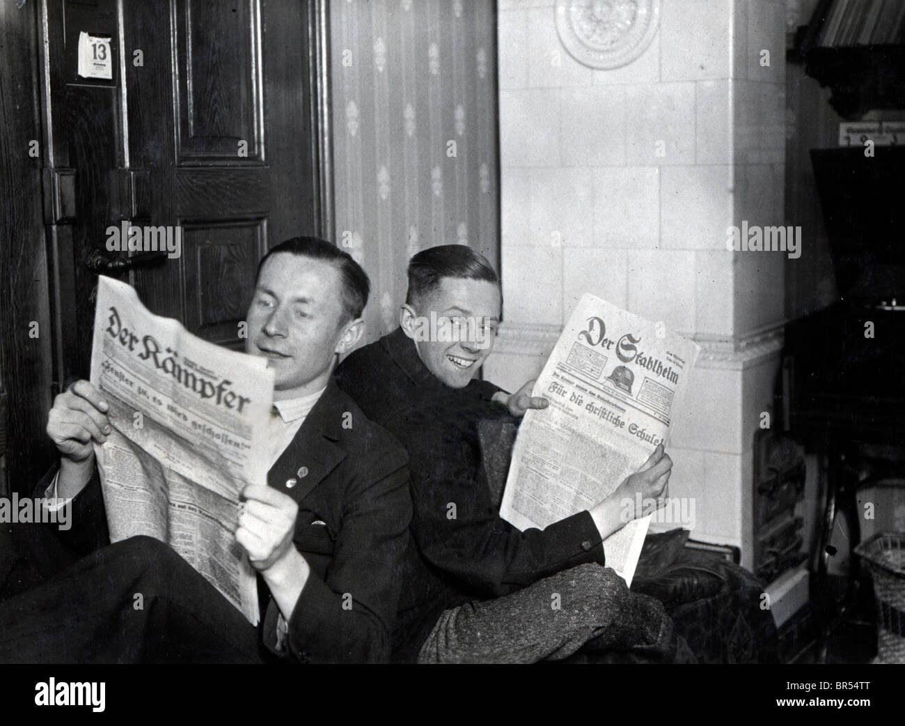 Historic photograph, two men reading newspapers, around 1922 Stock ...