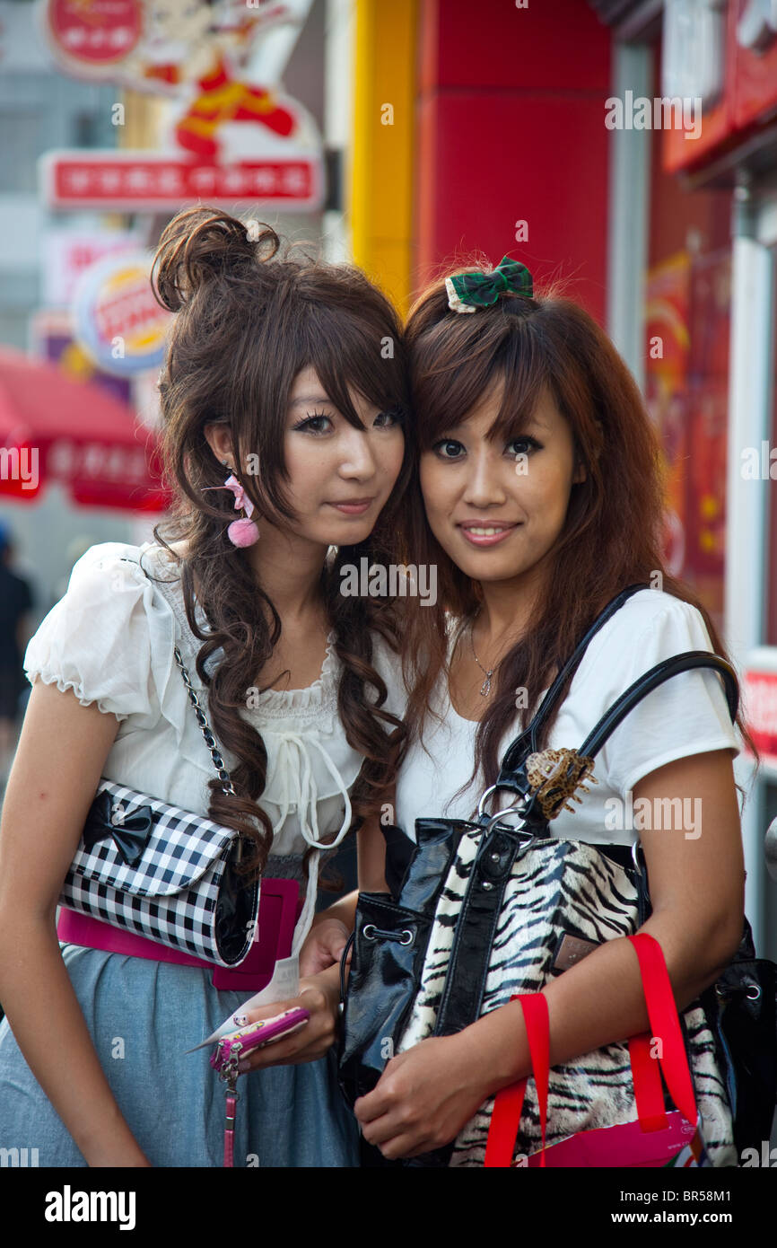 Two young women in Shanghai China Stock Photo - Alamy