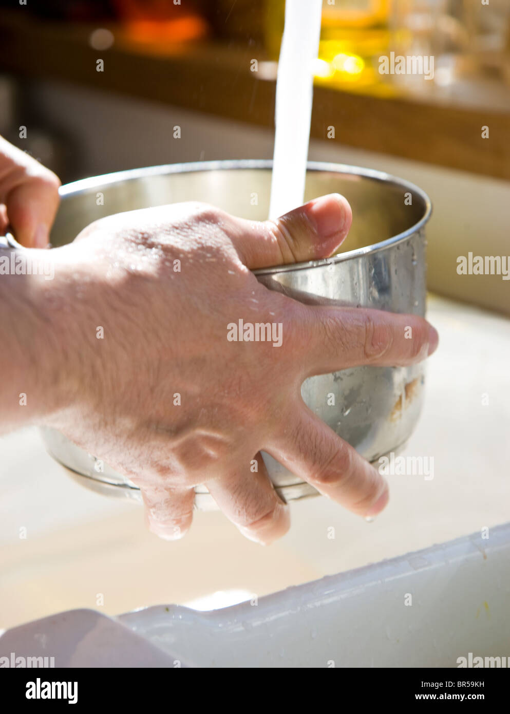 Saucepan filling with water hi-res stock photography and images - Alamy