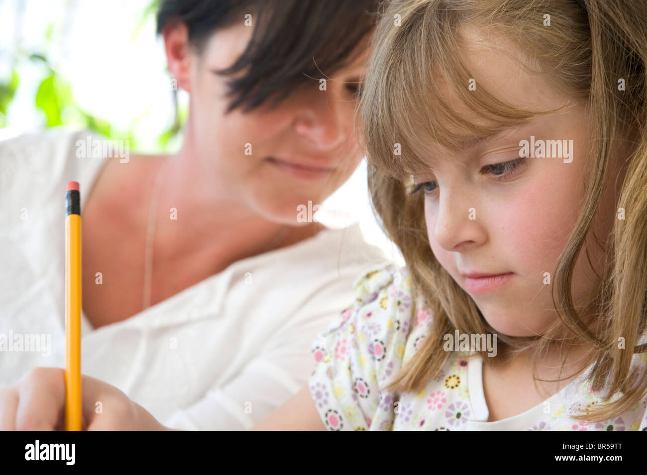 Mother child bonding doing project hi-res stock photography and images - Alamy