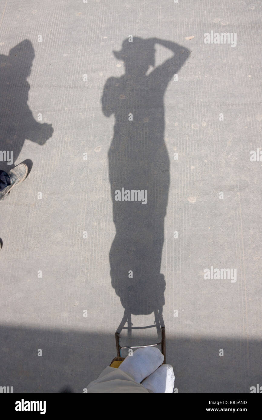 Shadow of tourist photographing, Kashgar, Xinjiang, China Stock Photo ...