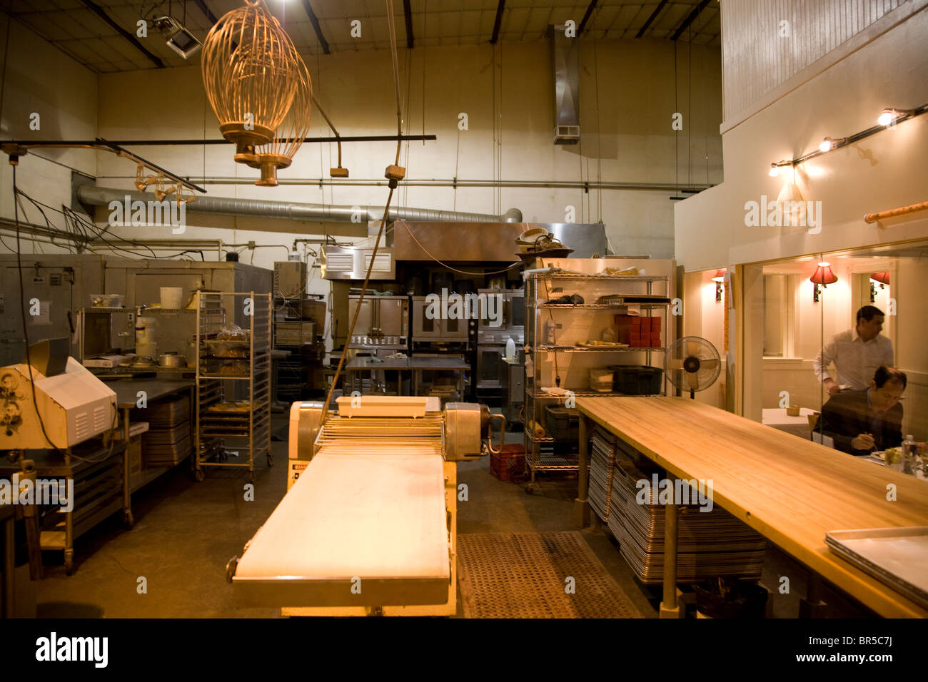 Interior of bakery with wire whisks hanging from the ceiling Stock ...