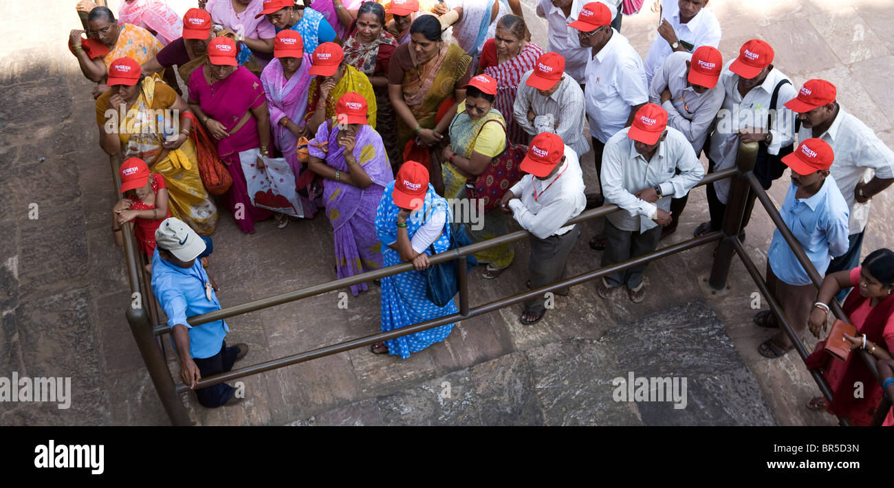 Group of Indian tourists with a guide at Sun Temple in Konark, Orissa ...