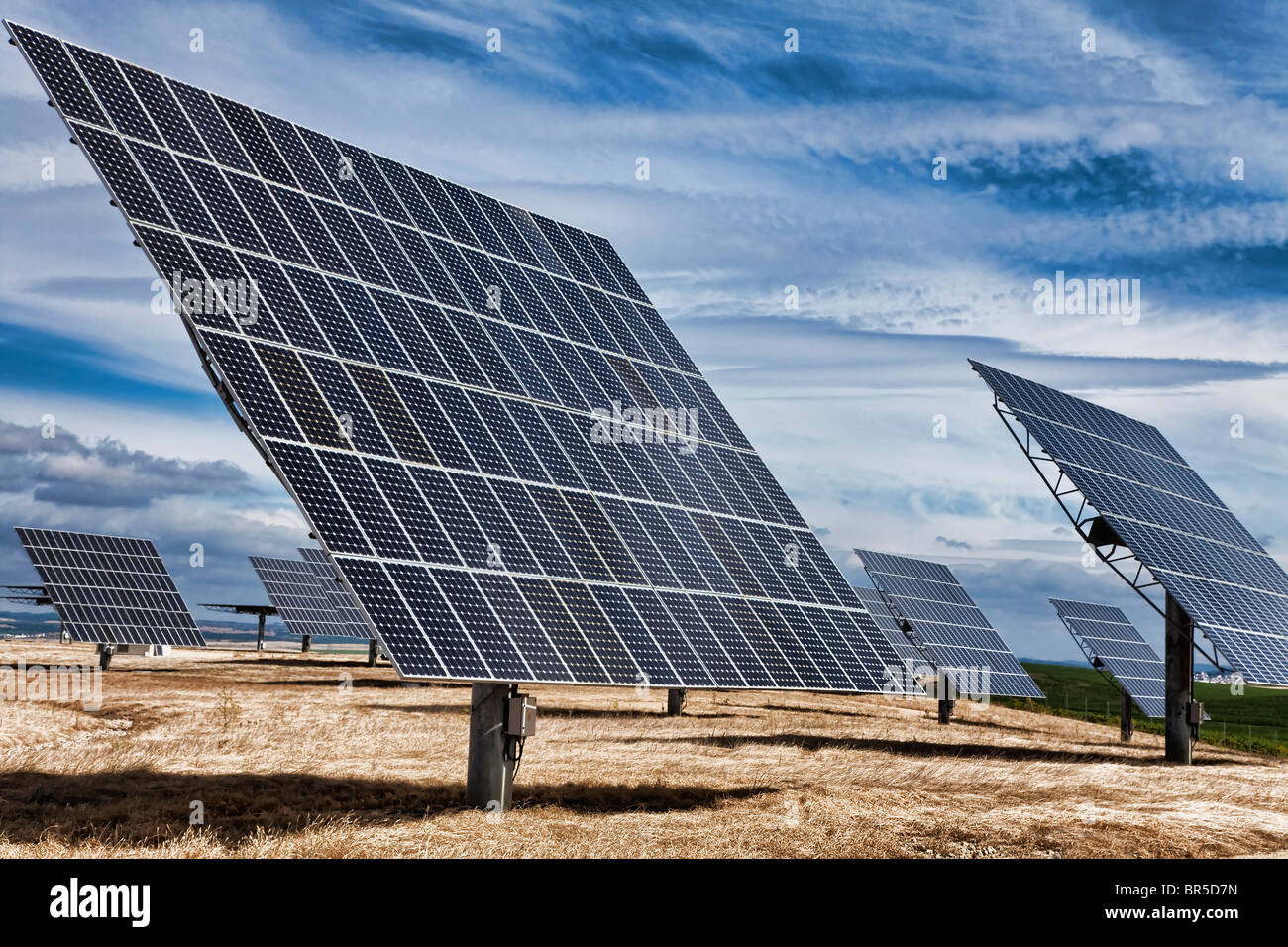 HDR photograph showing field of photovoltaic solar panels providing ...