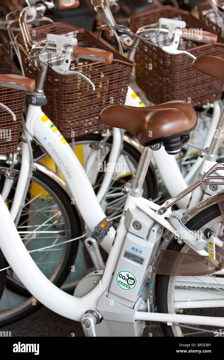 Community bicycle park, with 'Eneloop bicycles' which use rechargable ...