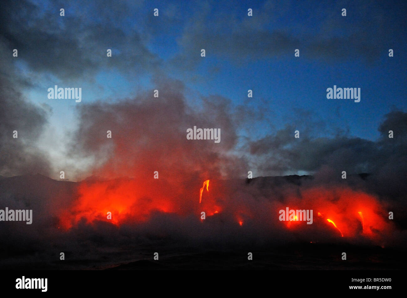Steam rising off lava flowing into ocean, Kilauea Volcano, Hawaii ...