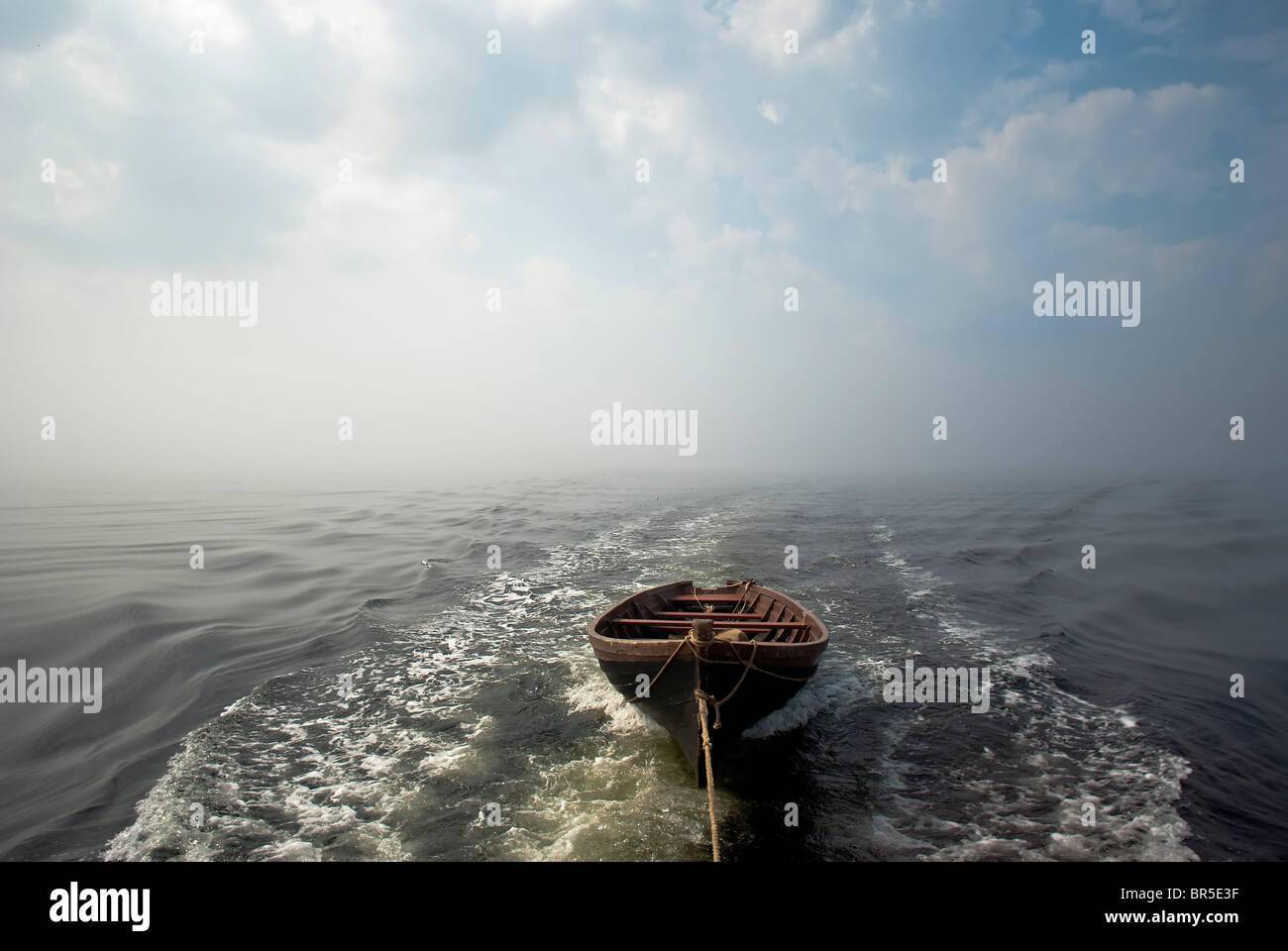 Boat in a fog Stock Photo - Alamy